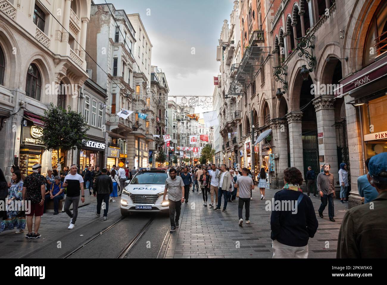 Picture of a populous crowd walking on the pedestrian street of ...