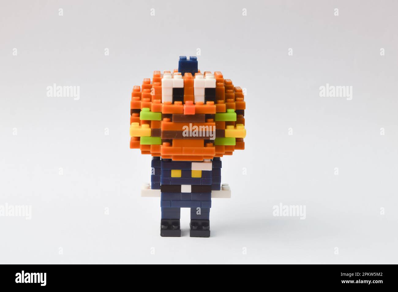 Toy security guard isolated on a white background Stock Photo - Alamy
