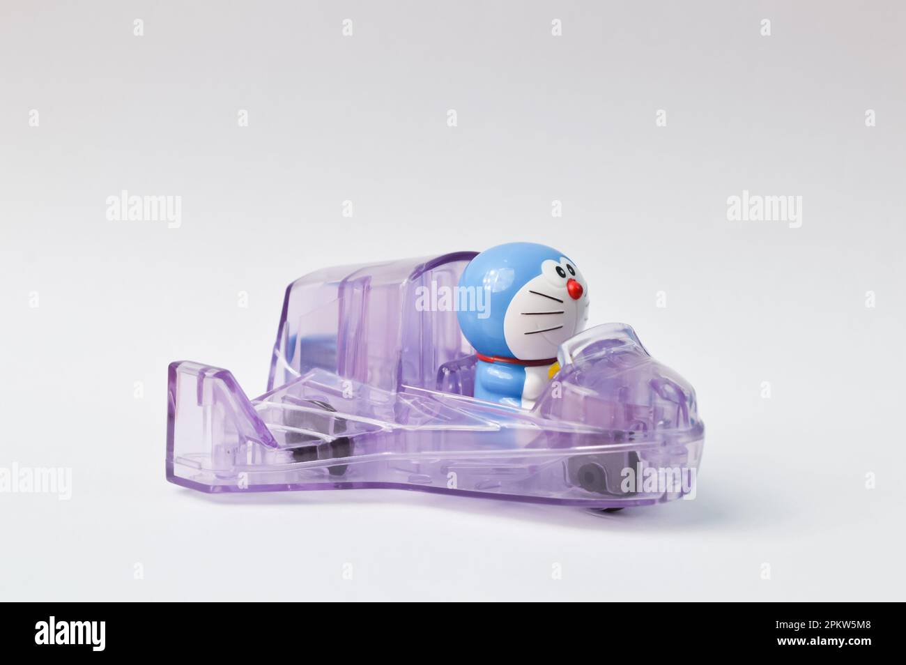 Doraemon toy with plane isolated on a white background Stock Photo - Alamy