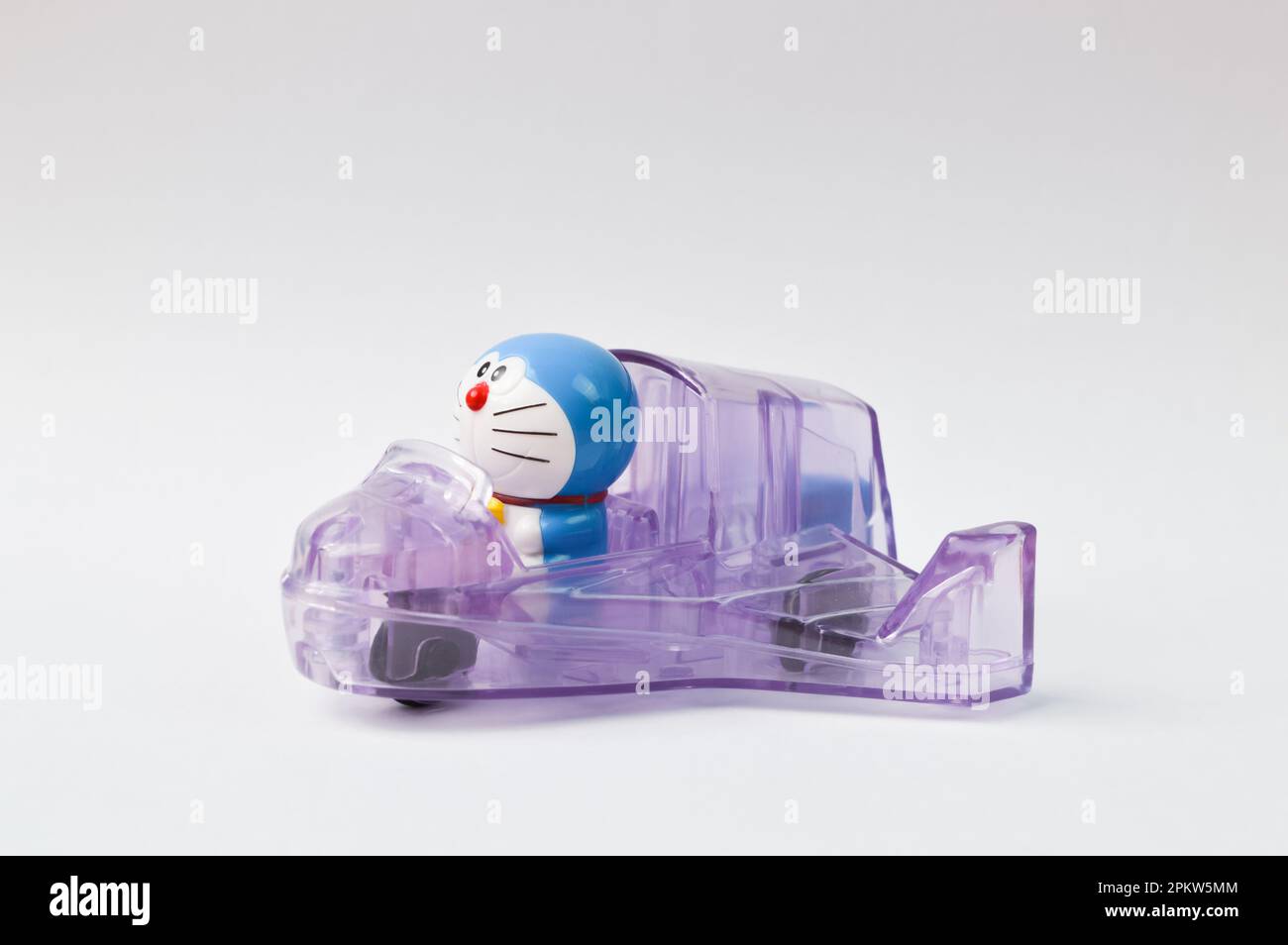Doraemon toy with plane isolated on a white background Stock Photo - Alamy