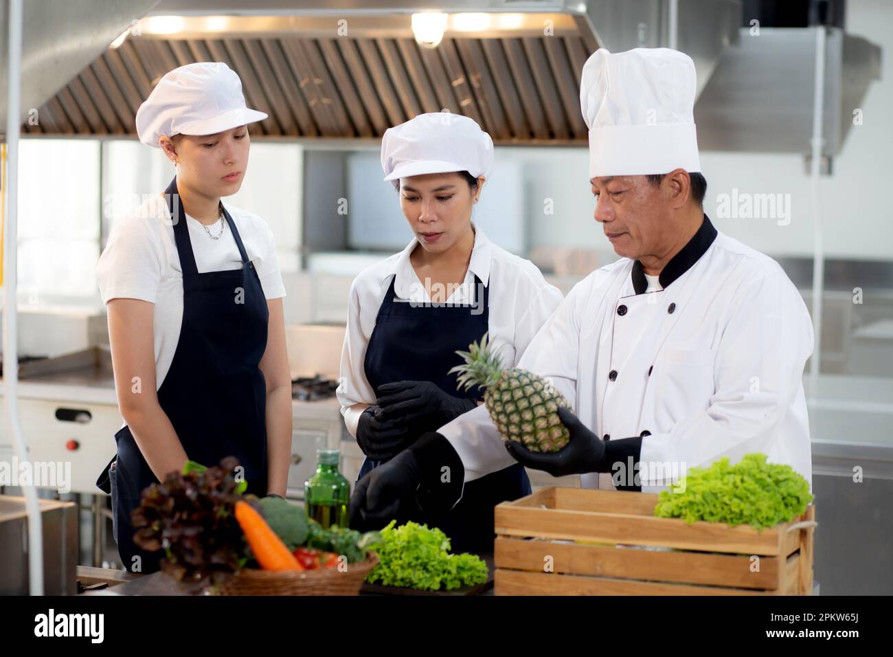 Male female chef explaining hi-res stock photography and images - Alamy