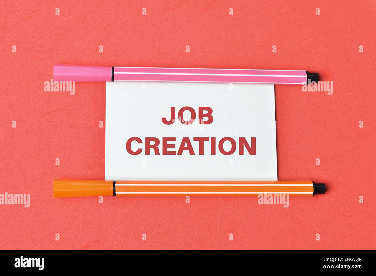 Pen colors and memo note written with JOB CREATION Stock Photo - Alamy