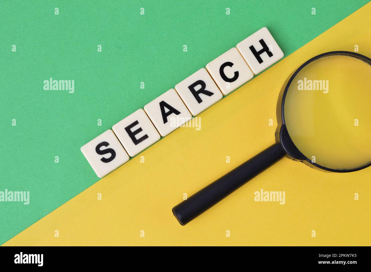 Magnify glass letters hi-res stock photography and images - Alamy