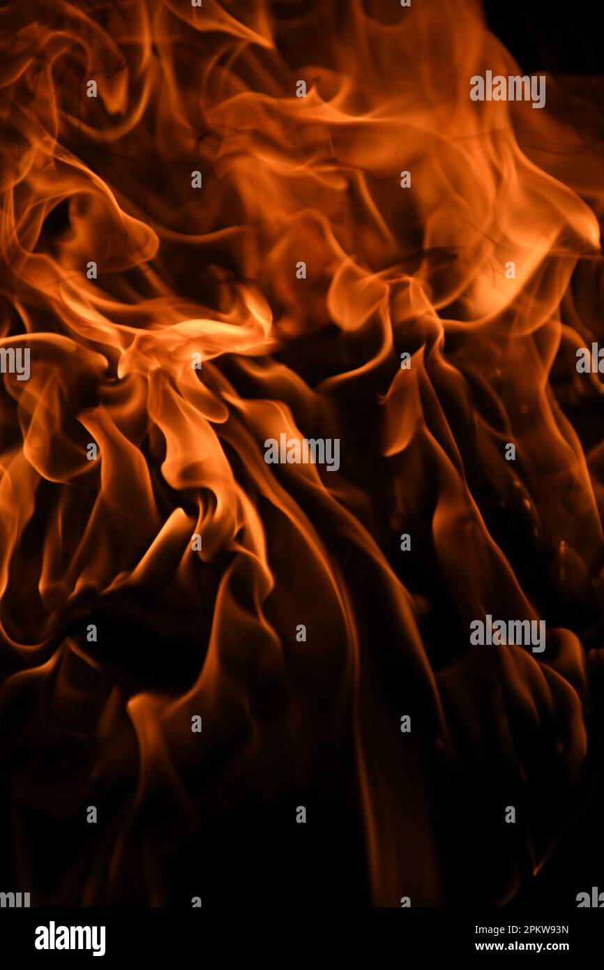 Blaze burning fire flame on art texture background Stock Photo - Alamy