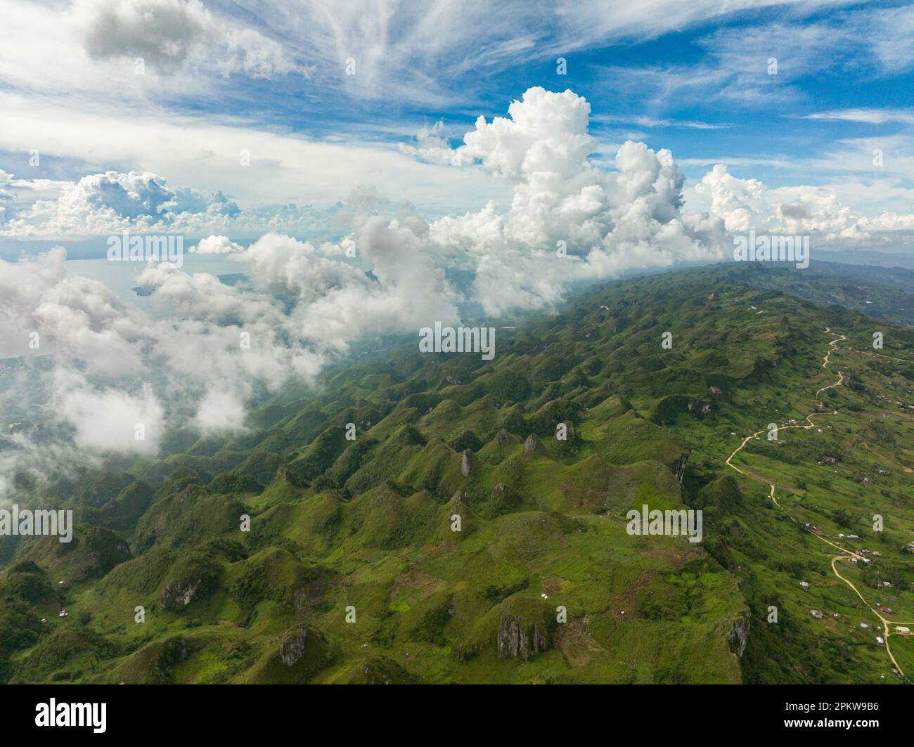 The slopes of mountains and hills in the fog. Osmena Peak. Mountain ...