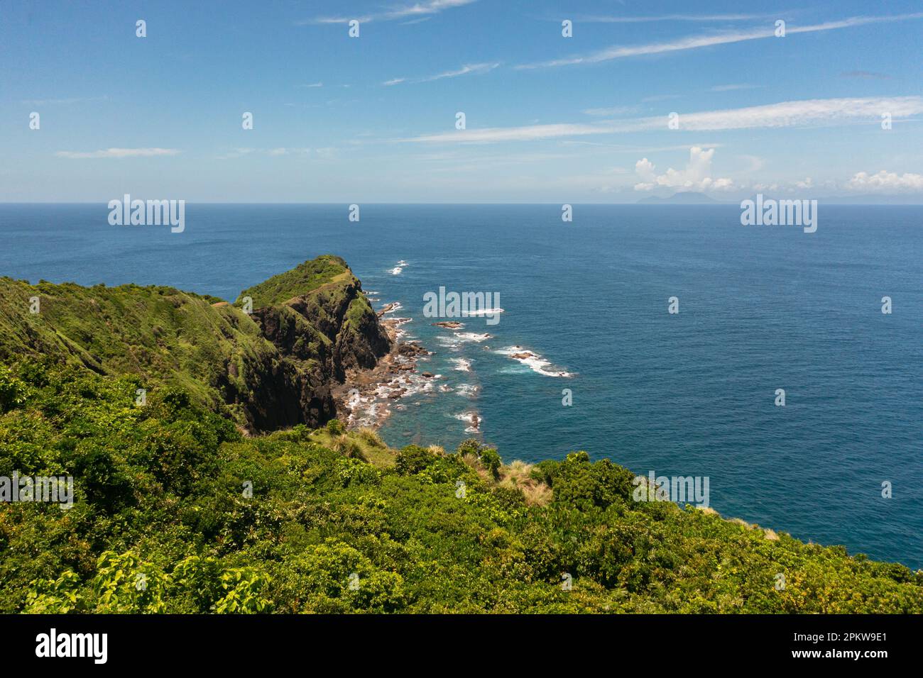Aerial view of Tropical island cape and blue ocean. Cape Engano. Palaui ...