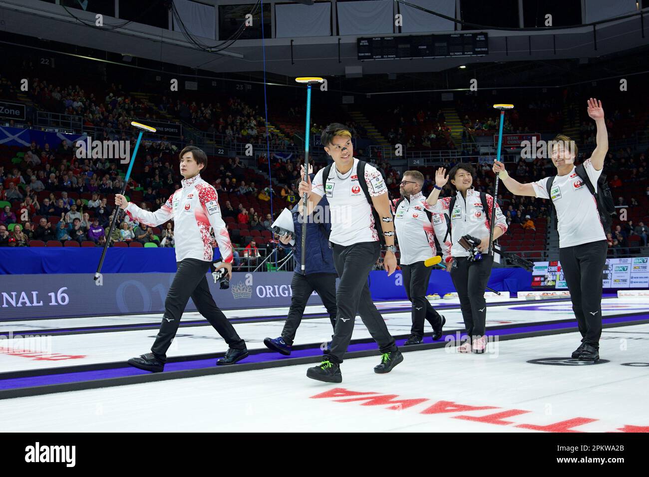 Team Japan salutes the crowd at the end of their last game at the 2023 ...