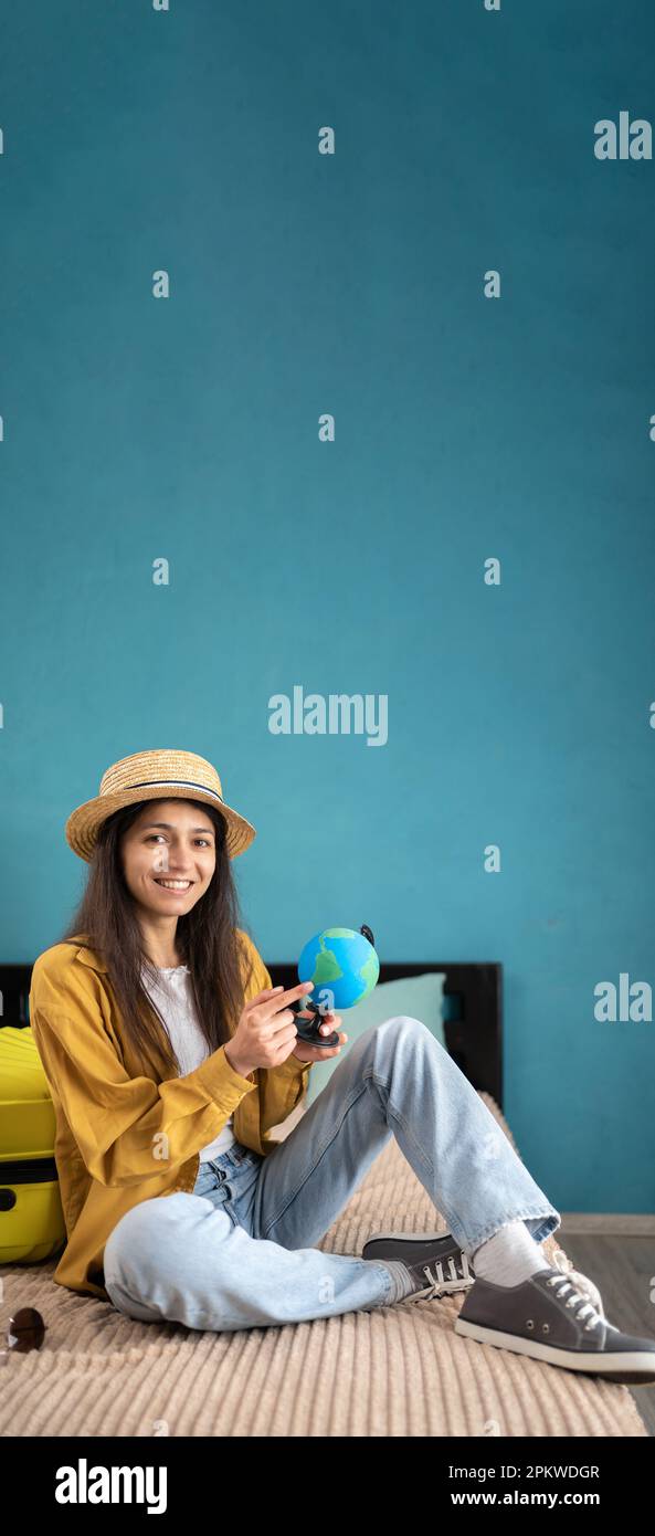 Traveler fun, happy smiling tourist woman in hat with Earth world globe ...
