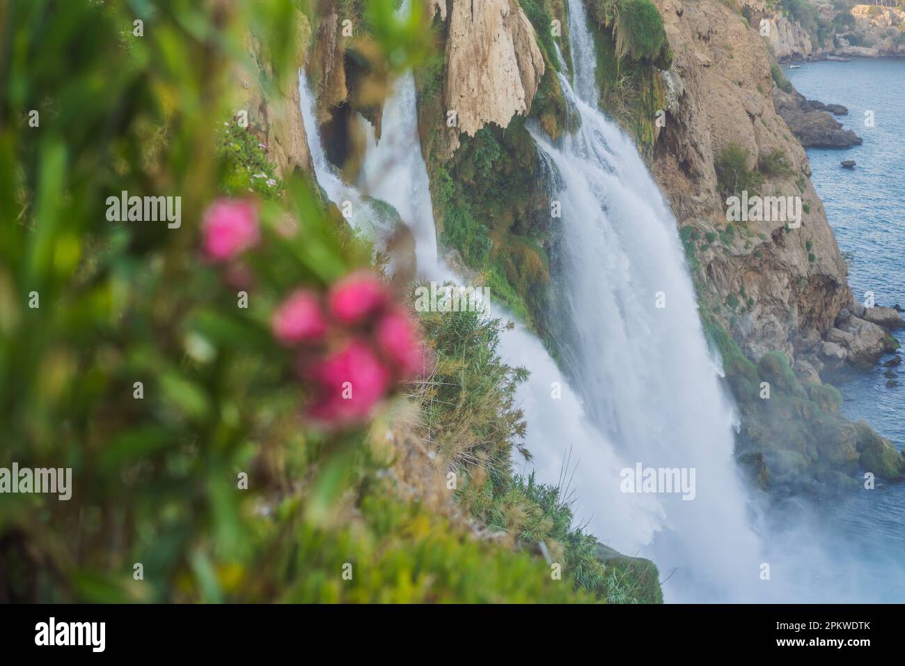 Lower Duden Falls drop off a rocky cliff falling from about 40 m into ...