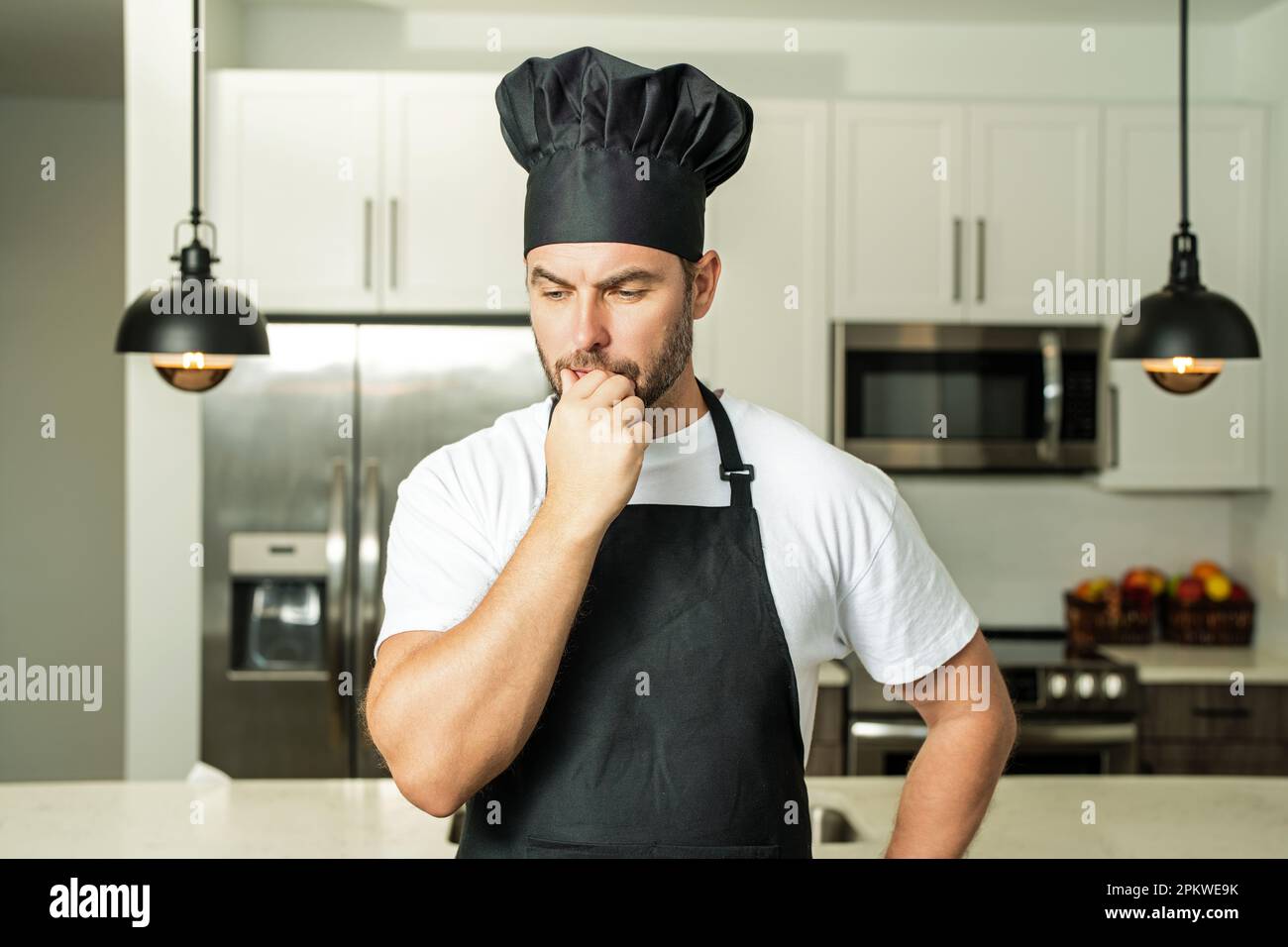 Man chef cooker baker. Millennial male chef in chefs uniform. Chef man ...
