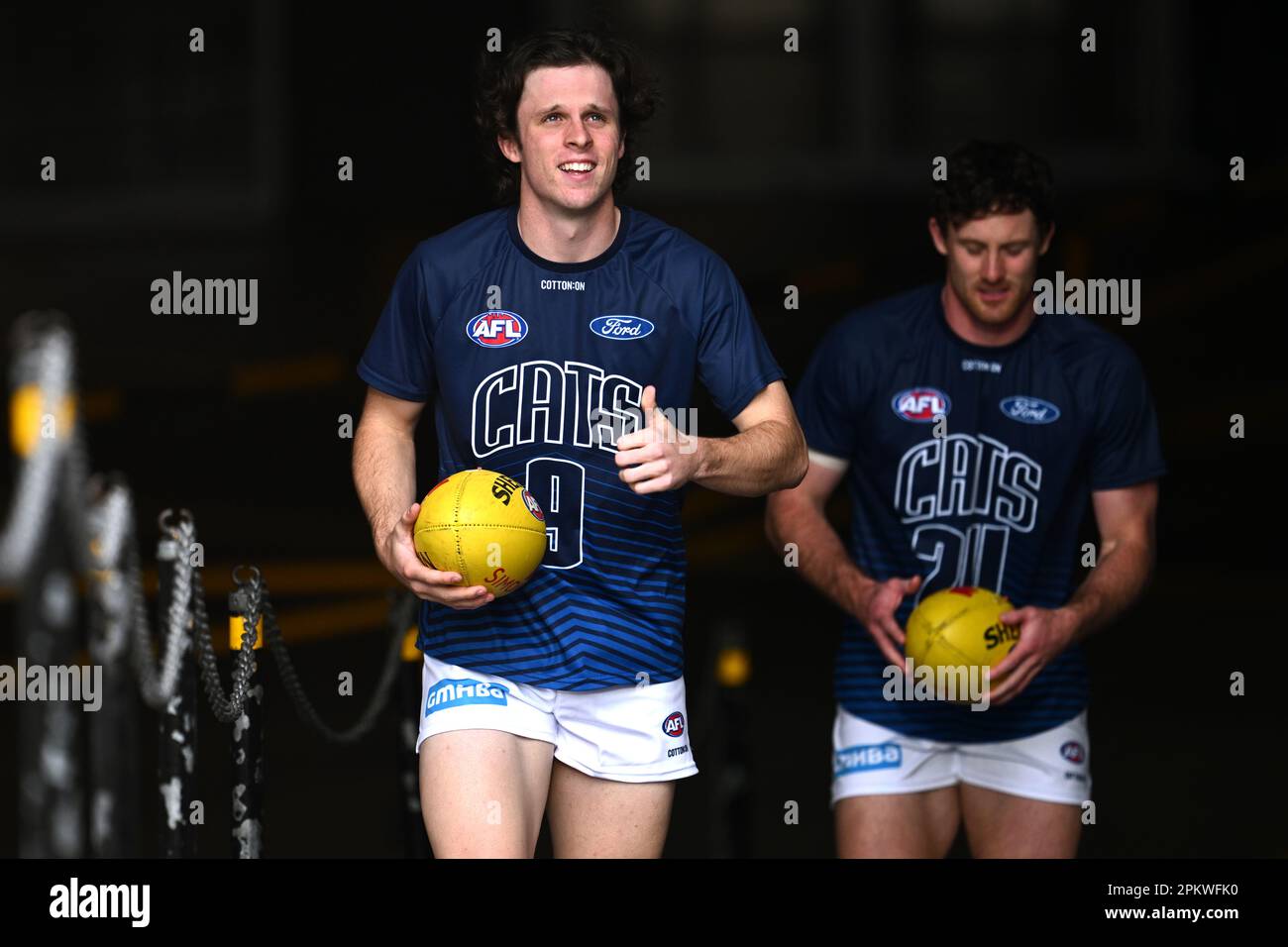 Max Holmes of Geelong warms up during the AFL Round 4 match between the ...