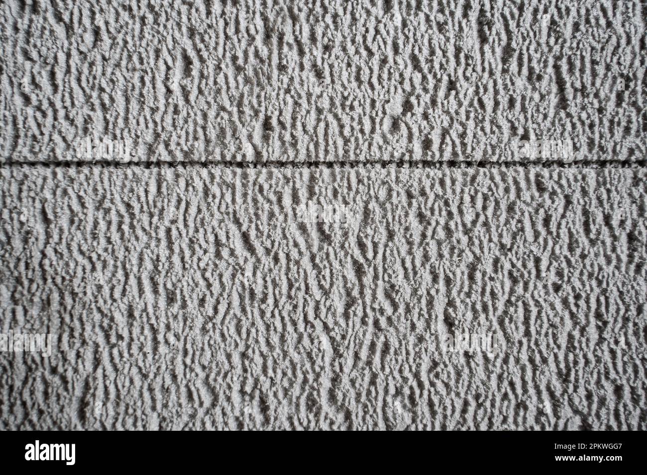 Dense gray polystyrene foam insulation close-up. Abstract background ...