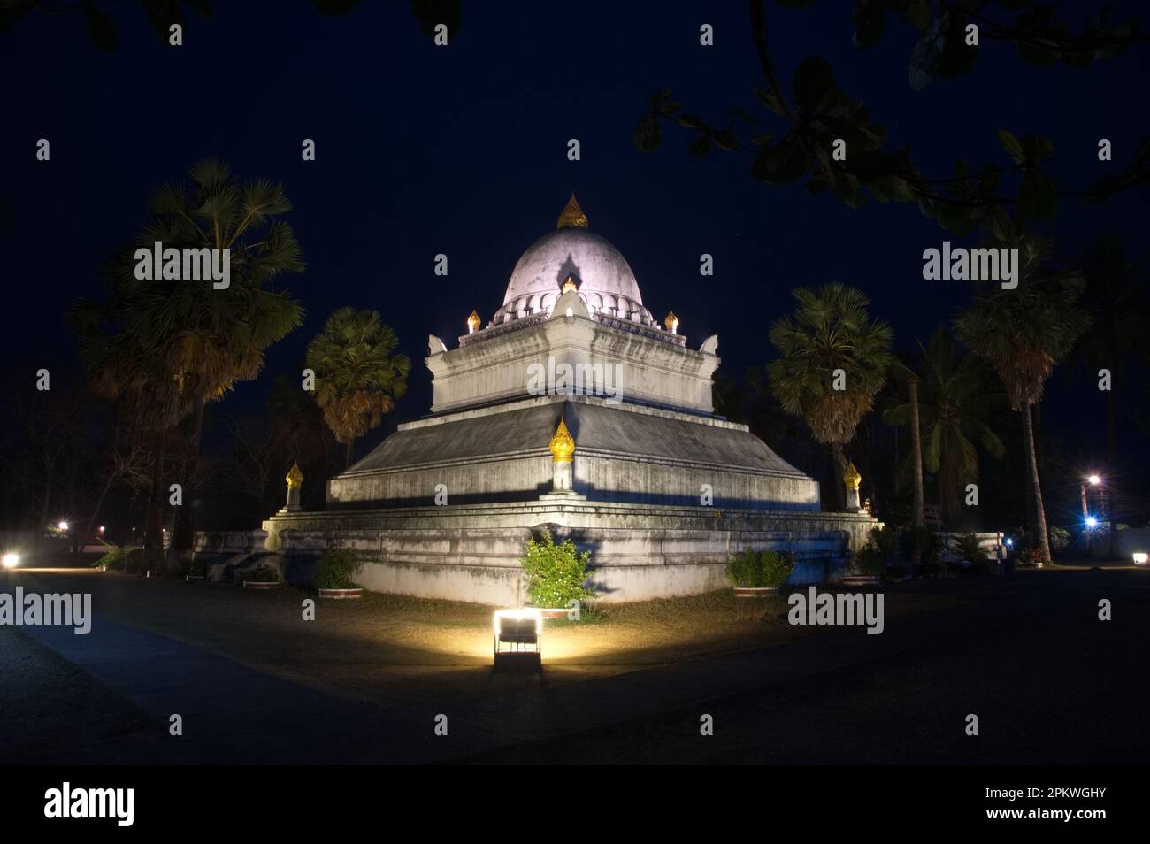 Scene of night time at the Lotus Stupa also known as "That Pathum" is ...