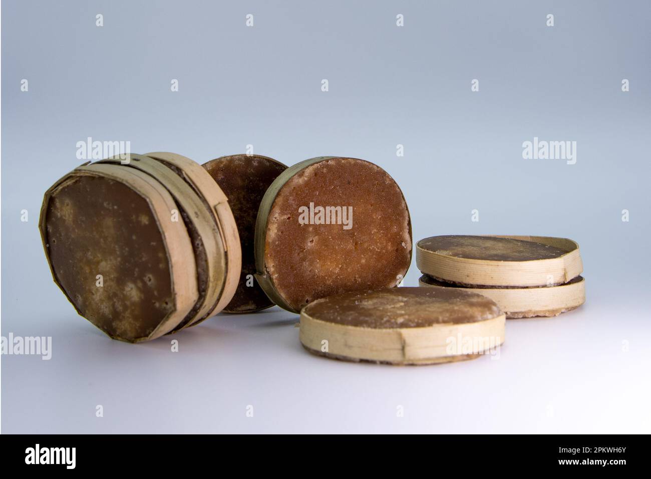 The palm jaggery isolated on white background Stock Photo - Alamy