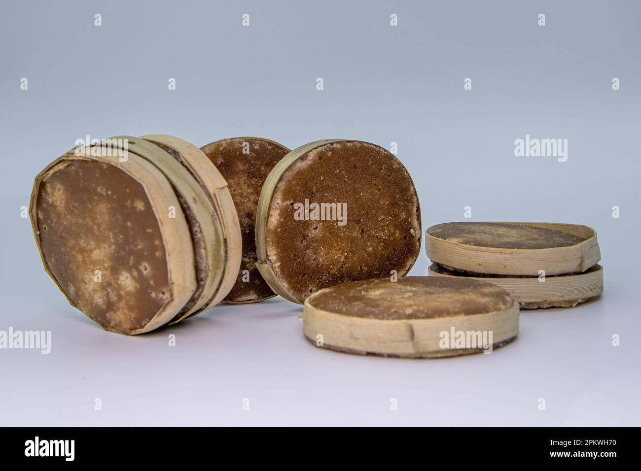 The palm jaggery isolated on white background Stock Photo - Alamy