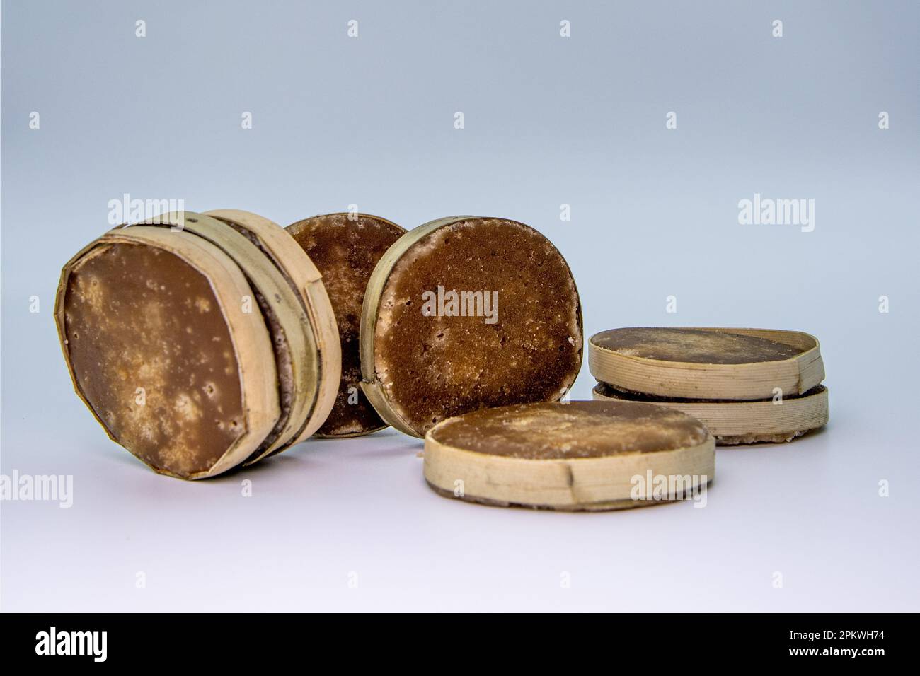The palm jaggery isolated on white background Stock Photo - Alamy