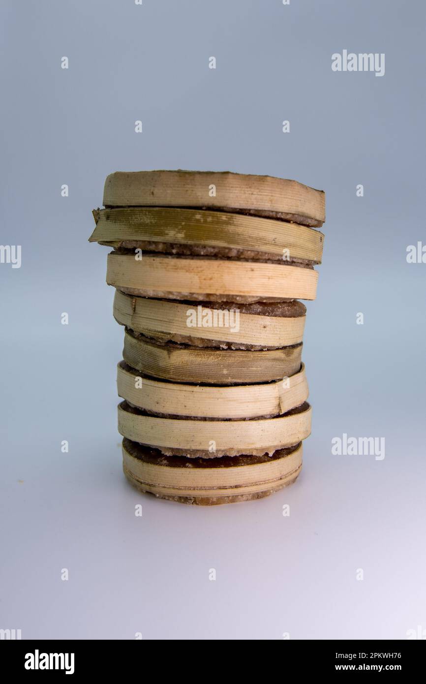 The palm jaggery isolated on white background Stock Photo - Alamy