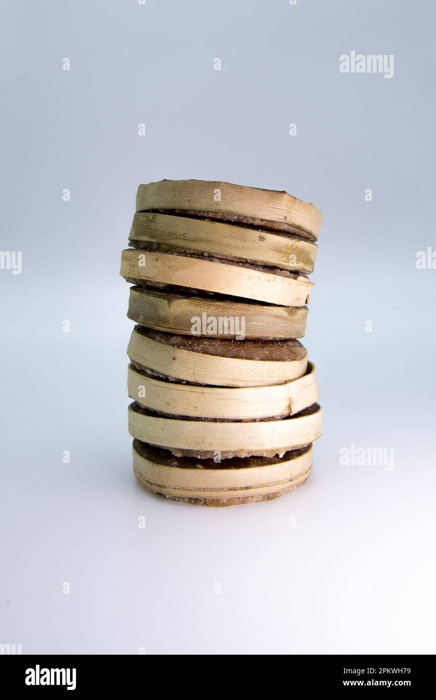 The palm jaggery isolated on white background Stock Photo - Alamy