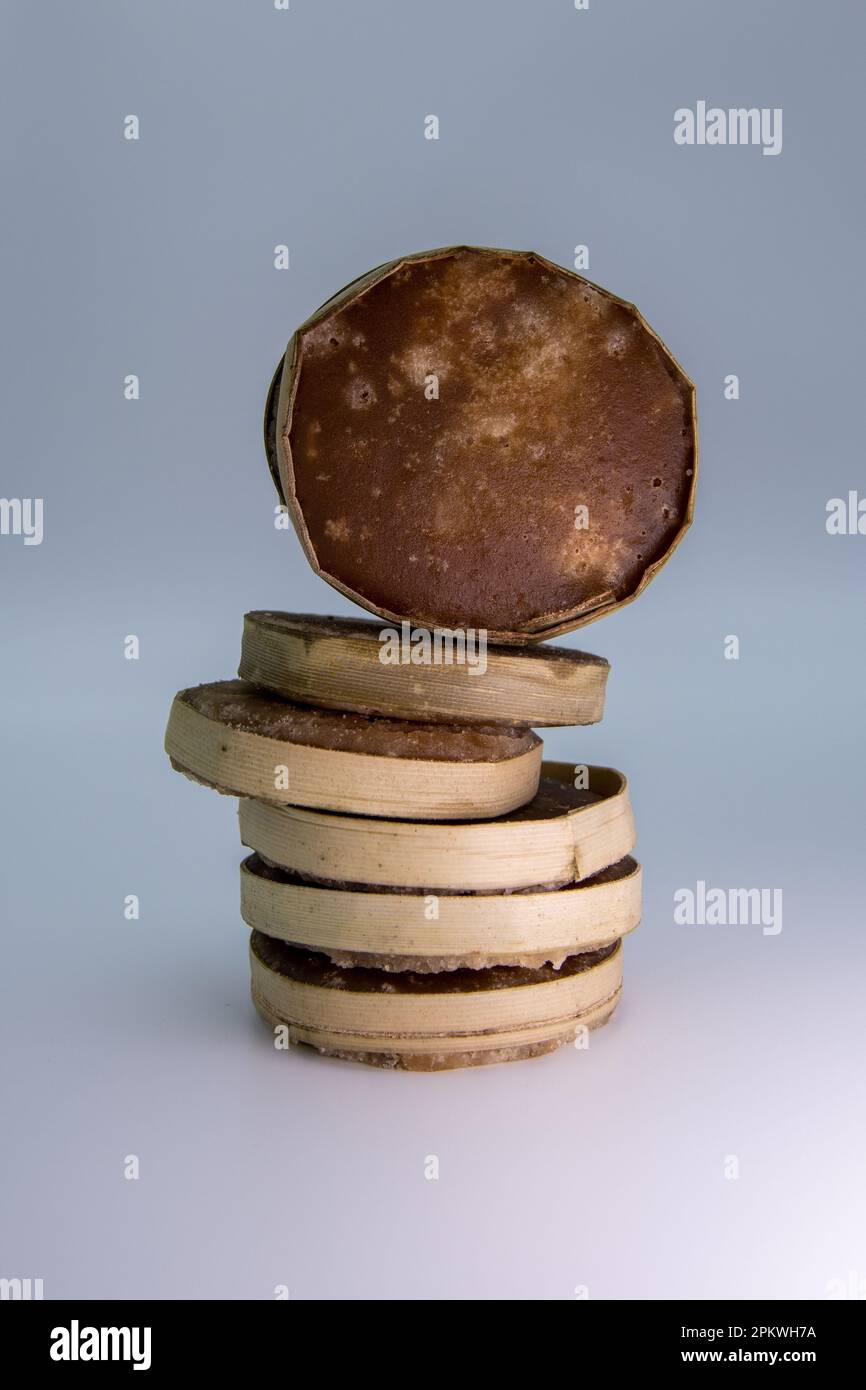 The palm jaggery isolated on white background Stock Photo - Alamy