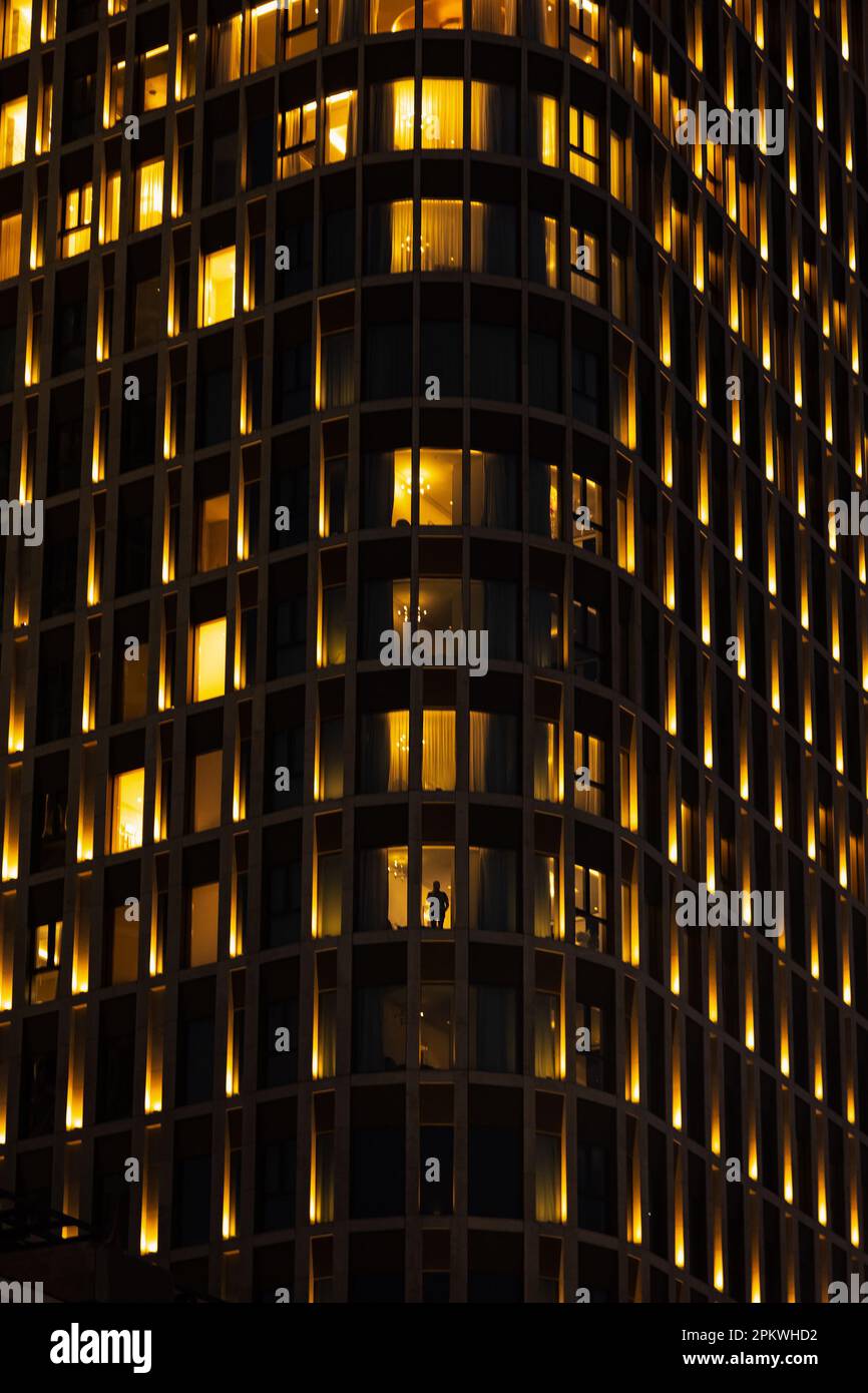 View of the beautifully illuminated facade of the building at night ...
