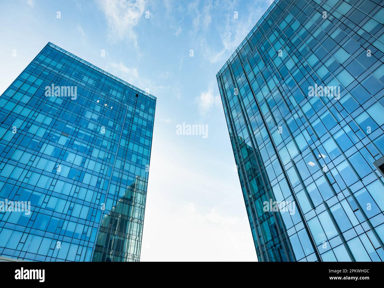 The geometry of modern urban architecture is reflected in the glass ...