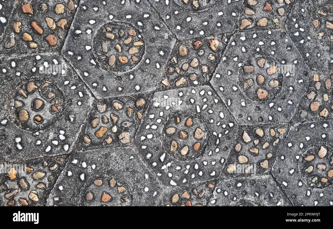 Stone pavement mosaic surface, close up Stock Photo - Alamy