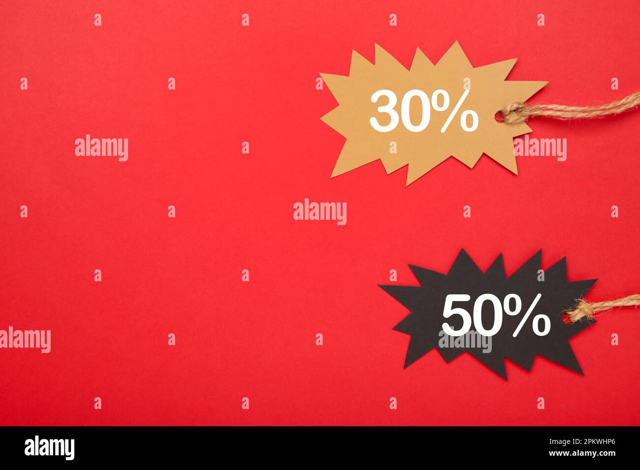 Two sale tags on red background with copy space. Top view Stock Photo ...
