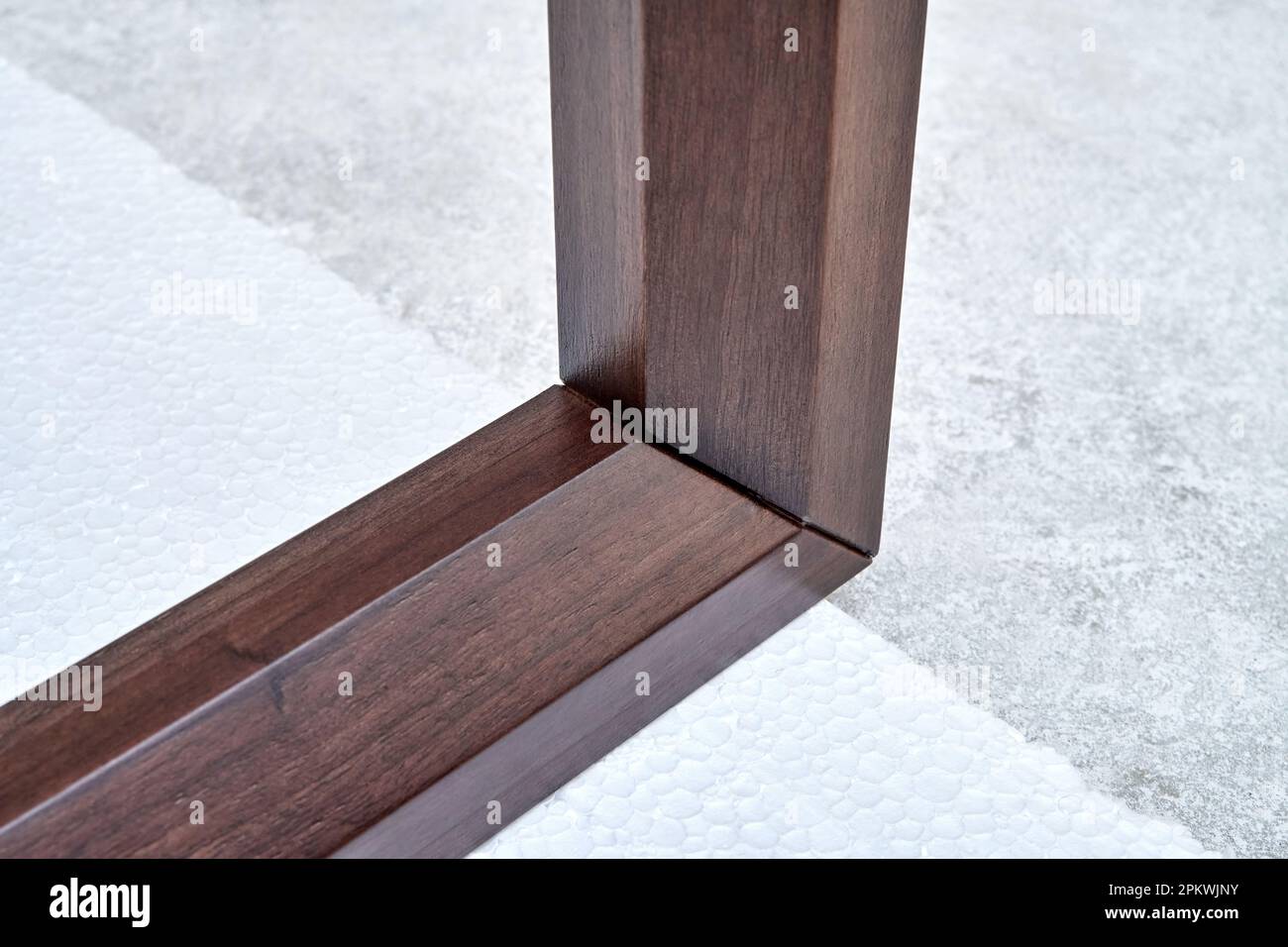 Wooden frame of bedside table made of solid walnut in workshop. Joinery ...