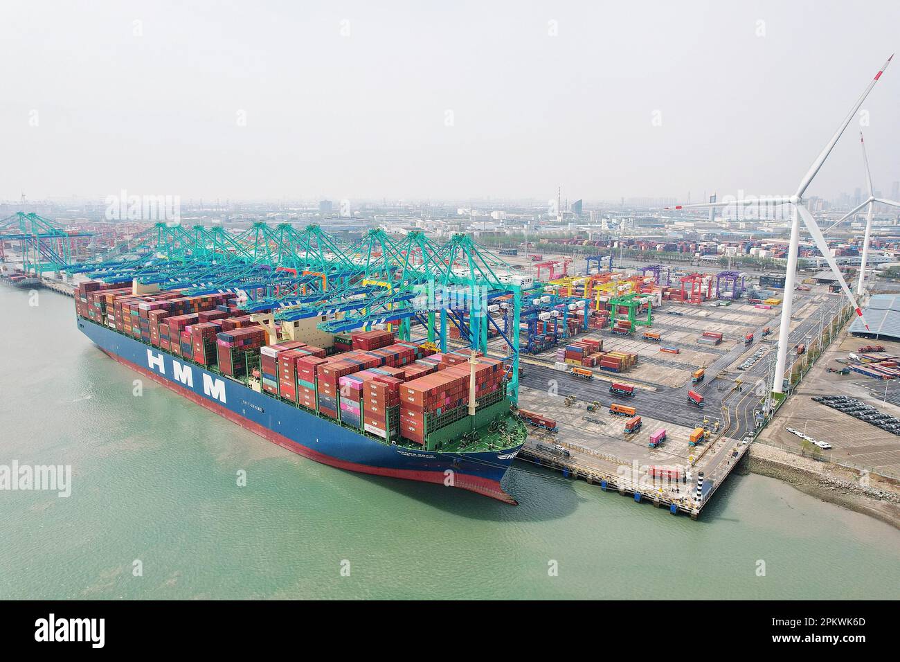 **CHINESE MAINLAND, HONG KONG, MACAU AND TAIWAN OUT** A container ship ...