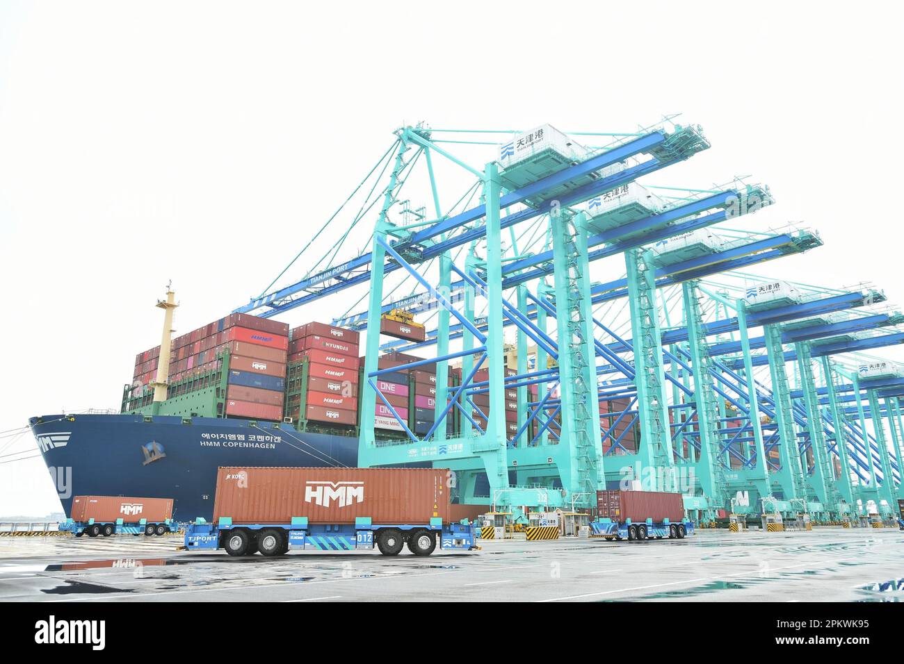 **CHINESE MAINLAND, HONG KONG, MACAU AND TAIWAN OUT** A container ship ...