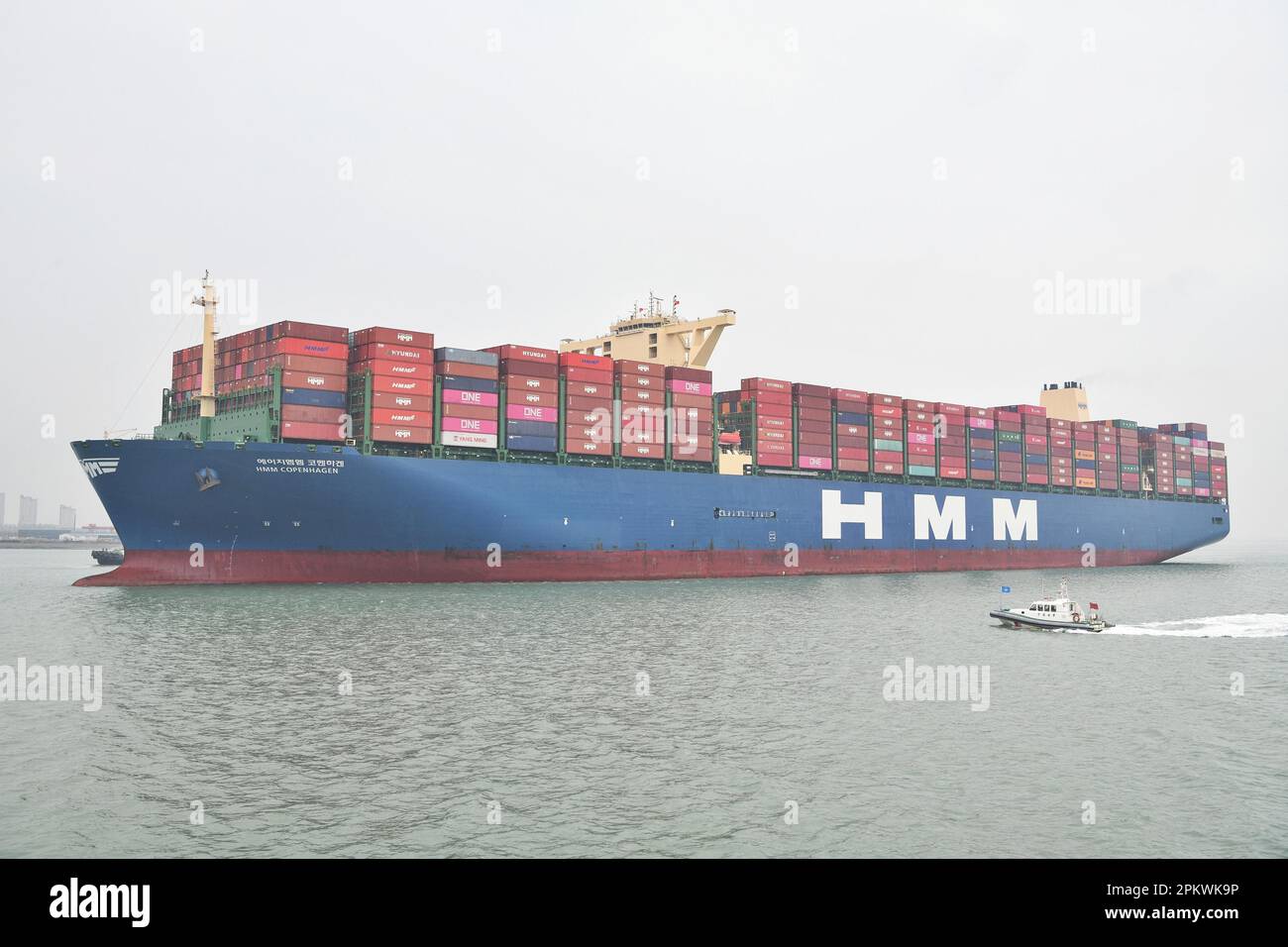 **CHINESE MAINLAND, HONG KONG, MACAU AND TAIWAN OUT** A container ship ...