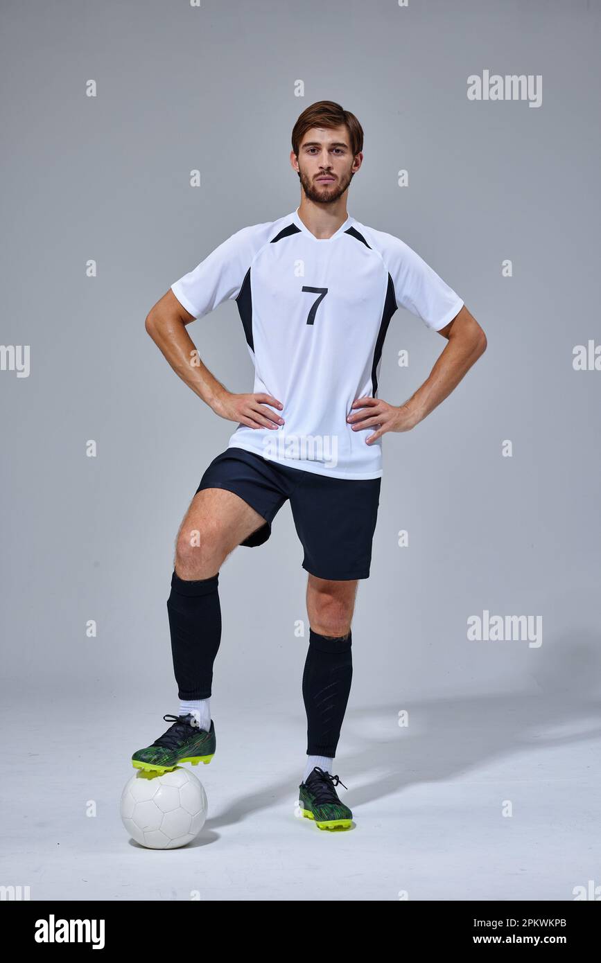 Soccer player studio portrait Stock Photo - Alamy
