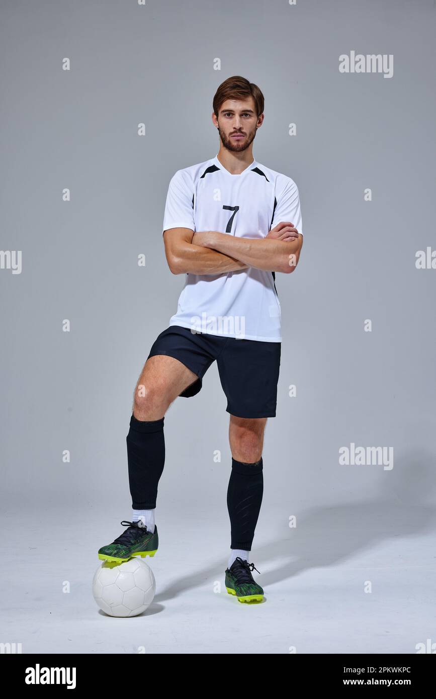 Soccer player studio portrait Stock Photo - Alamy