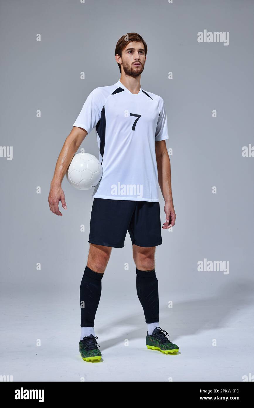 Soccer player studio portrait Stock Photo - Alamy