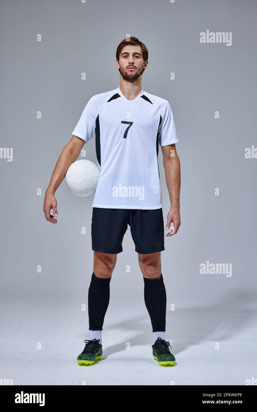 Soccer player studio portrait Stock Photo - Alamy