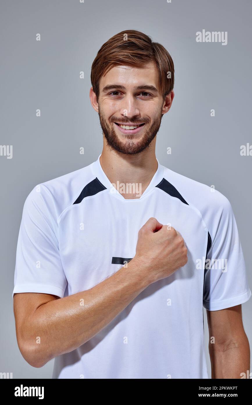 Soccer player studio portrait Stock Photo - Alamy