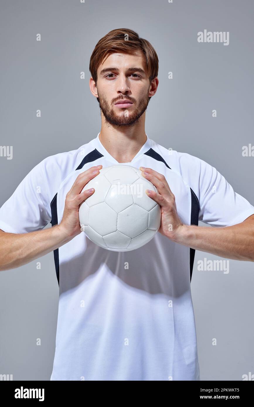 Soccer player studio portrait Stock Photo - Alamy