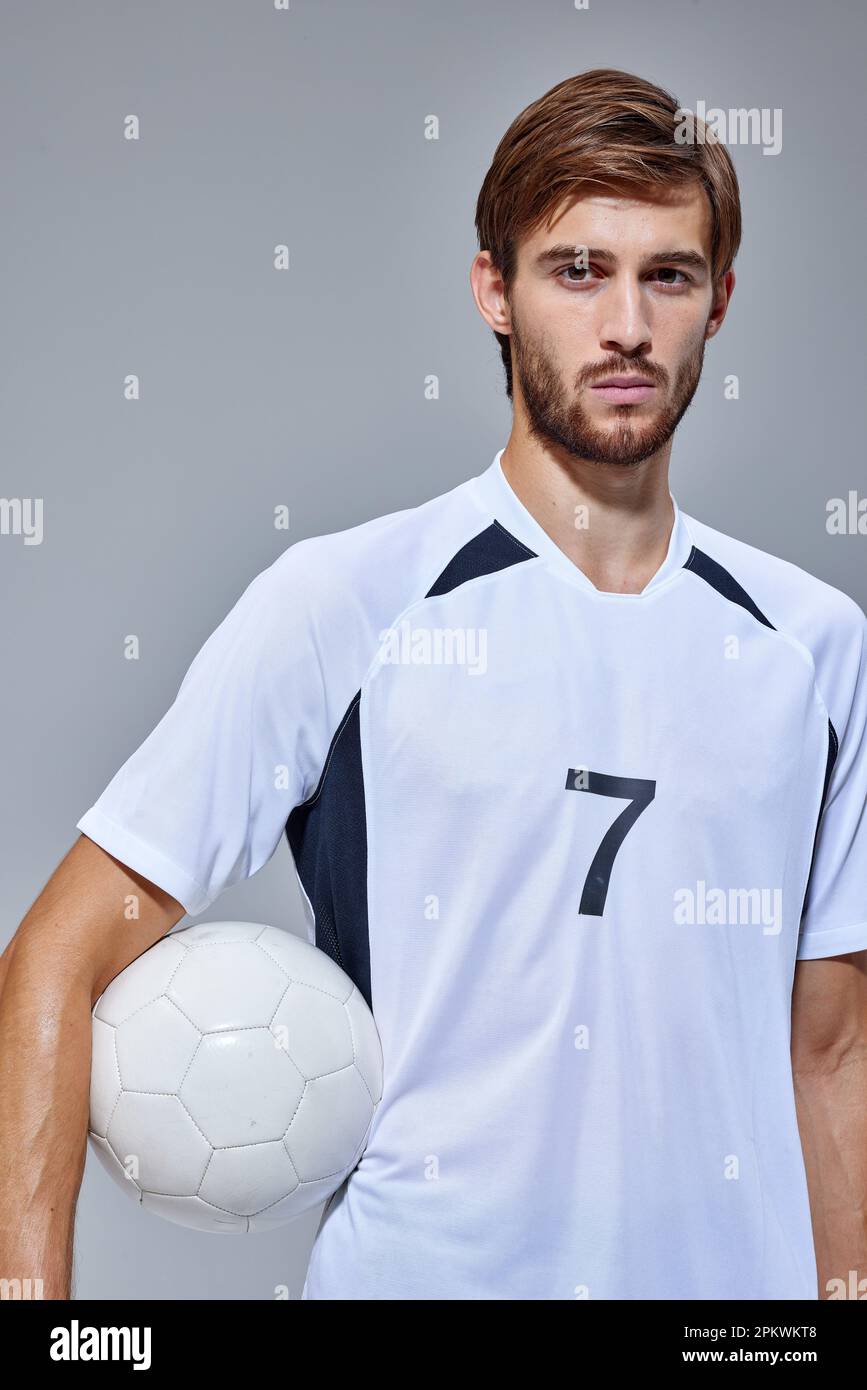 Soccer player studio portrait Stock Photo - Alamy