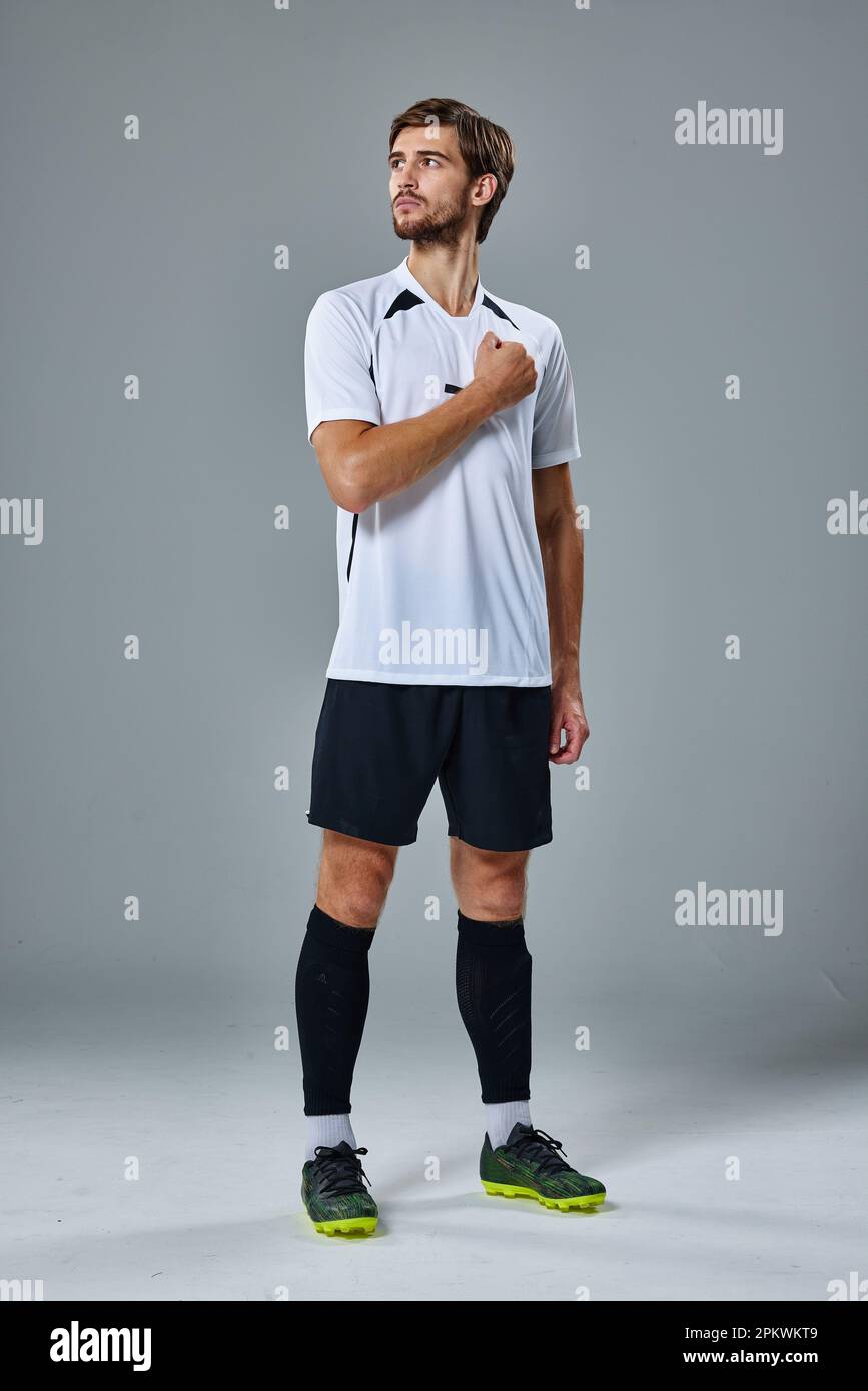 Soccer player studio portrait Stock Photo - Alamy