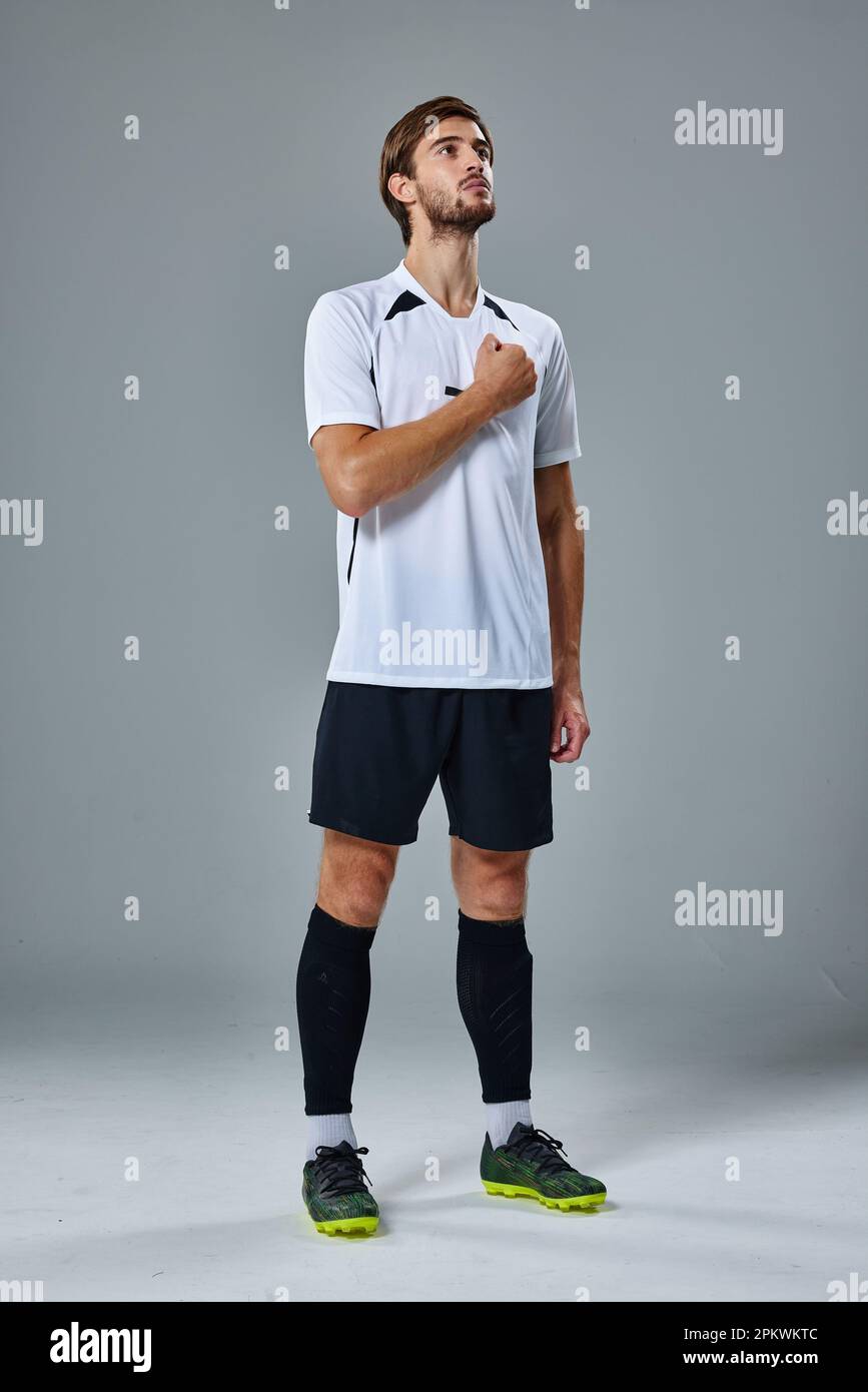 Soccer player studio portrait Stock Photo - Alamy