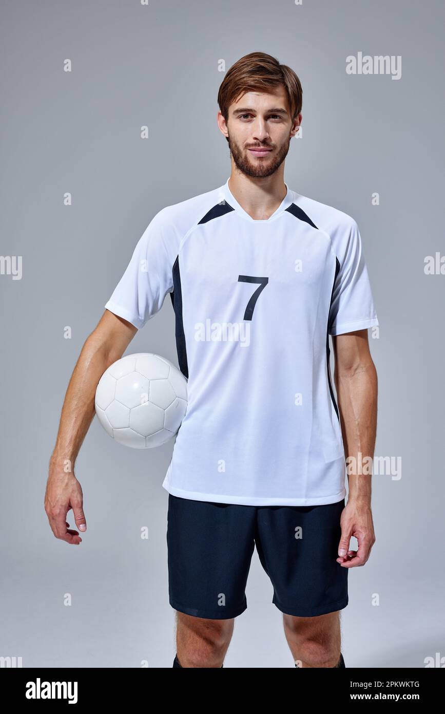 Soccer player studio portrait Stock Photo - Alamy
