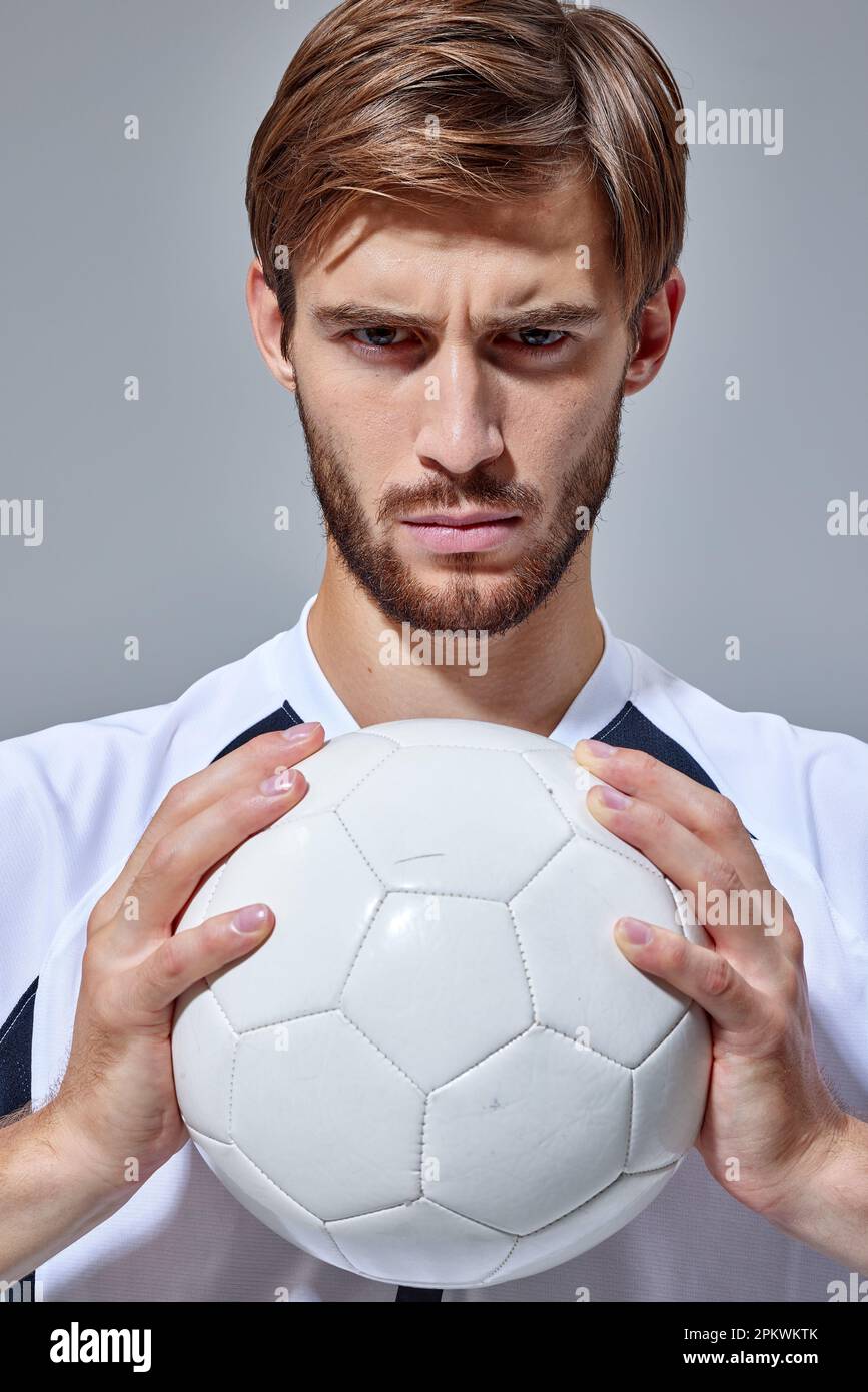 Soccer player studio portrait Stock Photo - Alamy
