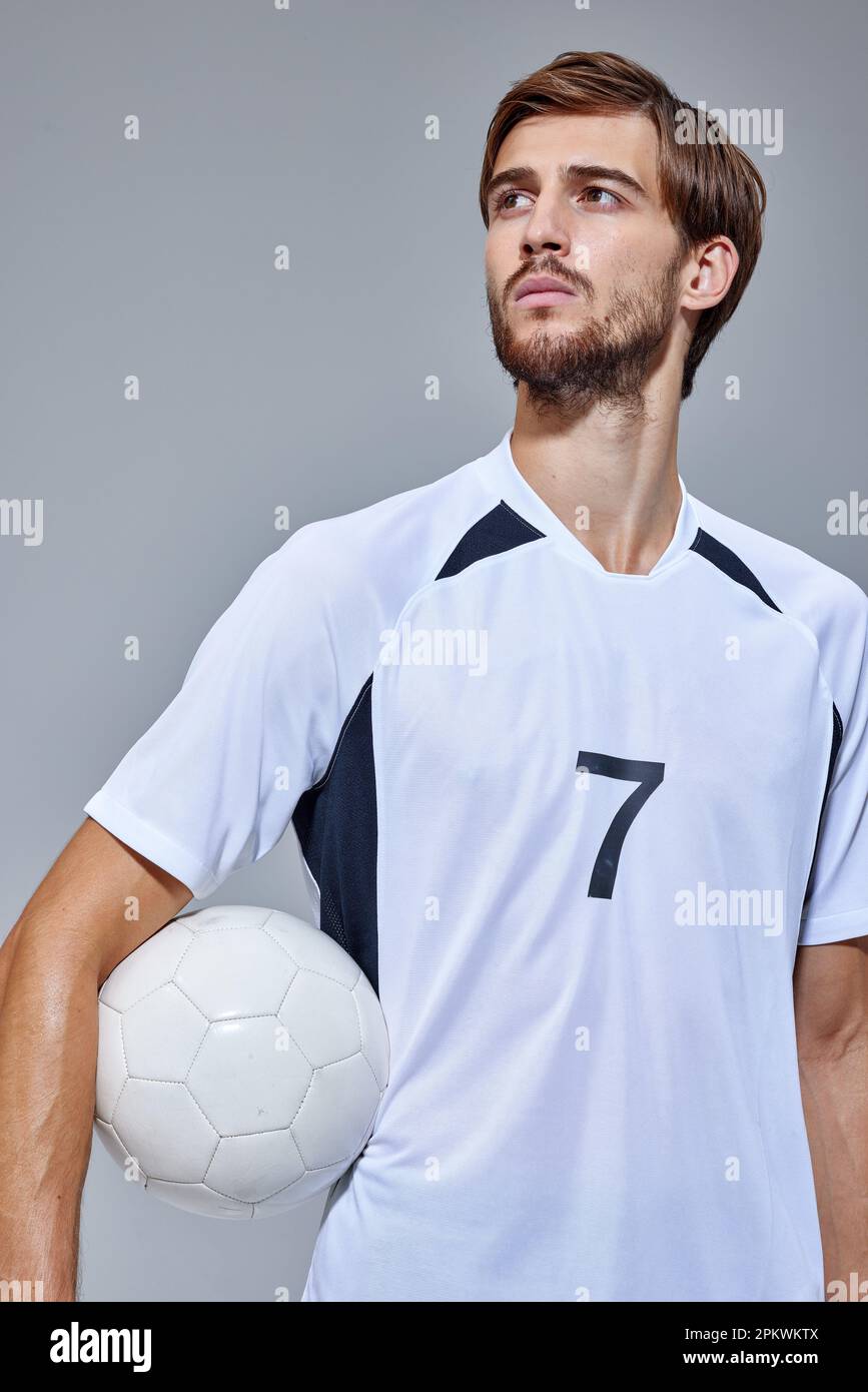 Soccer player studio portrait Stock Photo - Alamy