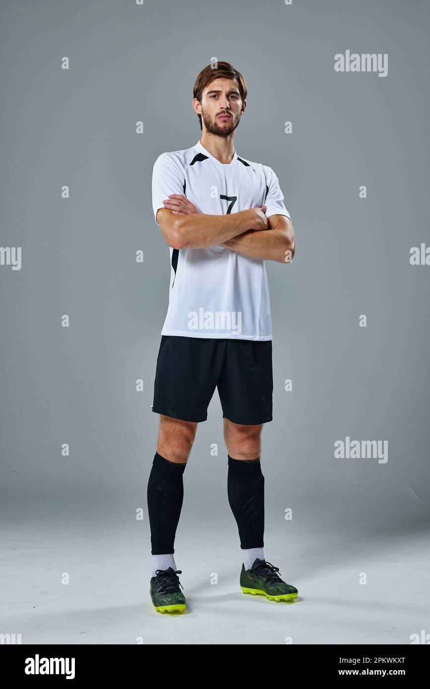 Soccer player studio portrait Stock Photo - Alamy