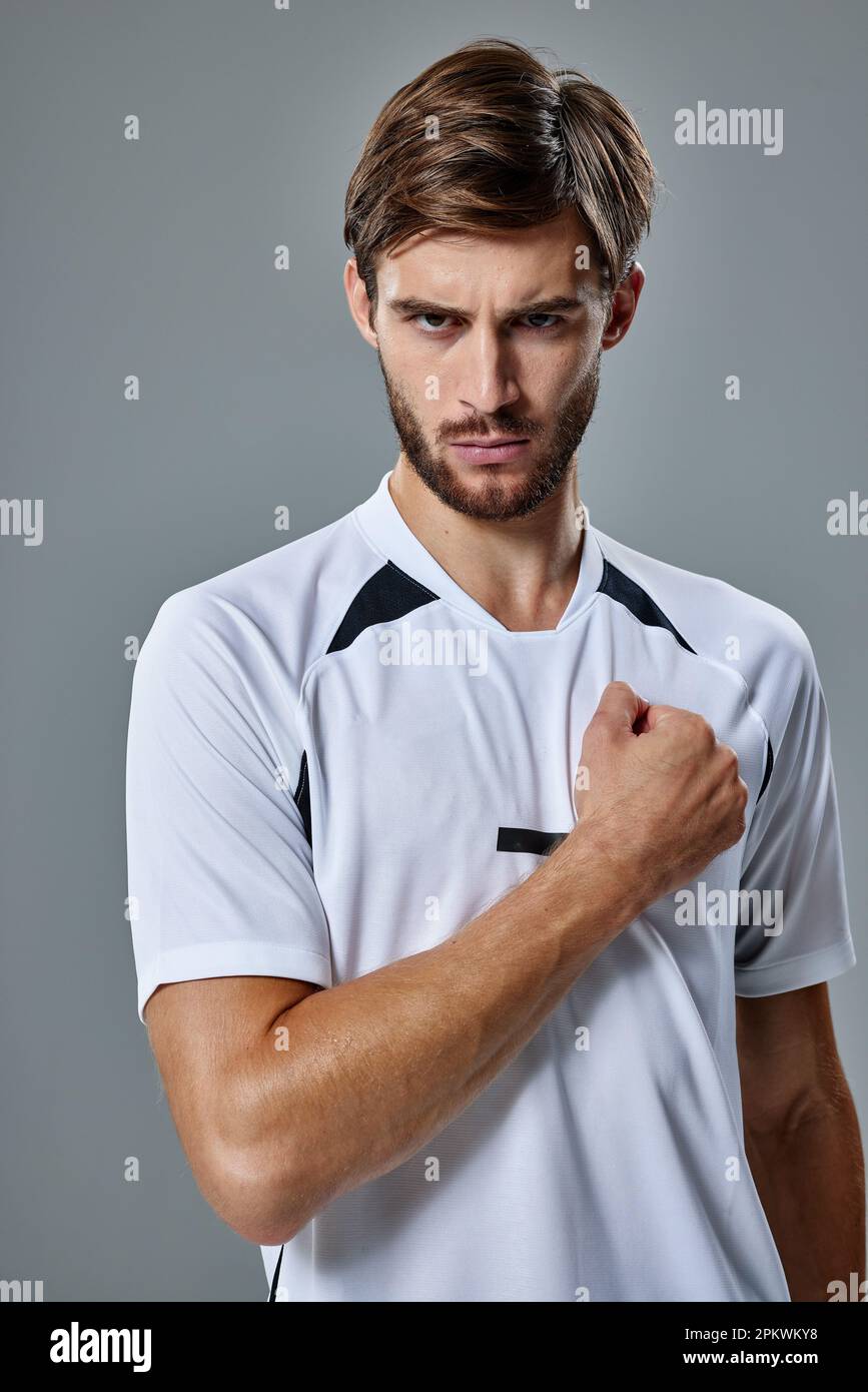 Soccer player studio portrait Stock Photo - Alamy