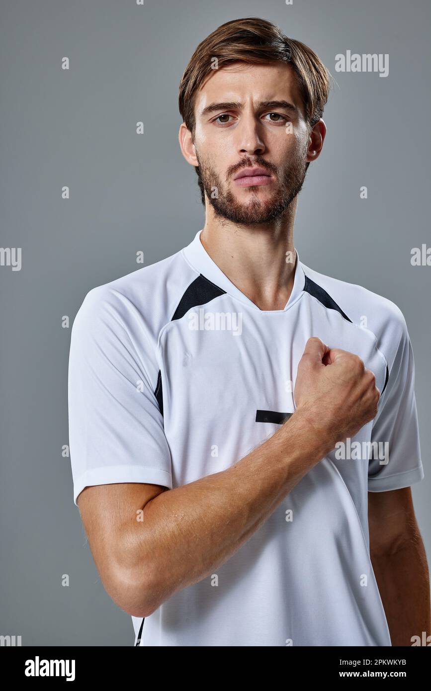Soccer player studio portrait Stock Photo - Alamy