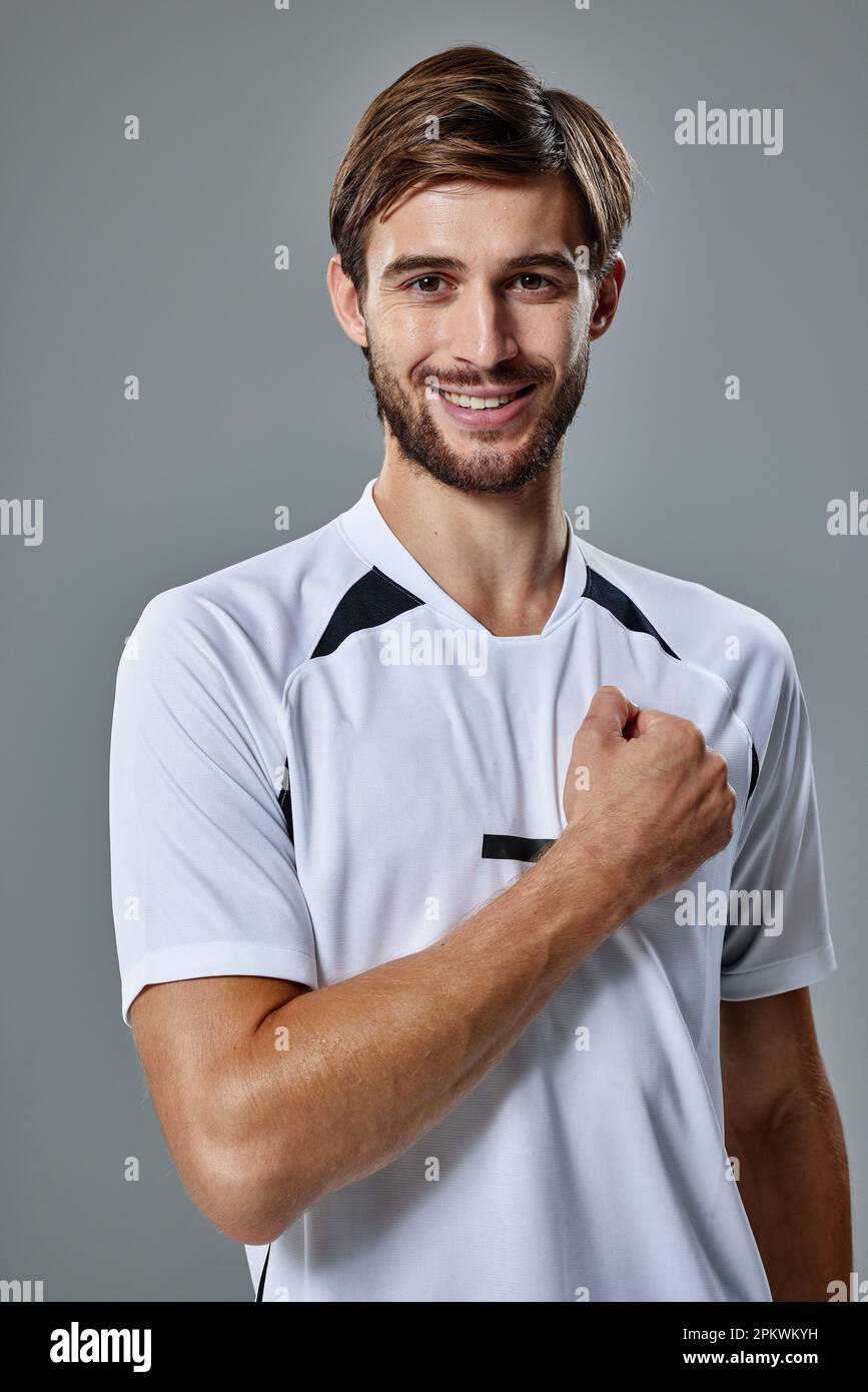Soccer player studio portrait Stock Photo - Alamy