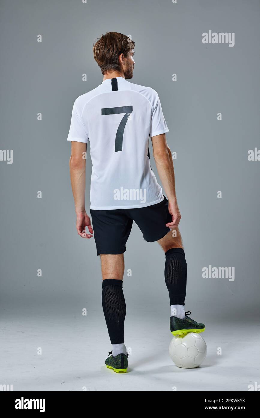 Soccer player studio portrait Stock Photo - Alamy