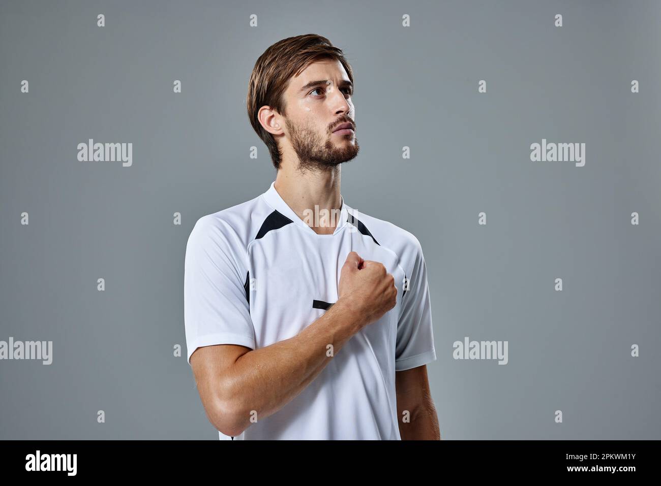 Soccer player studio portrait Stock Photo - Alamy