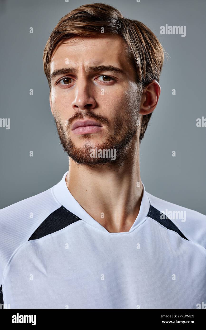 Soccer player studio portrait Stock Photo - Alamy